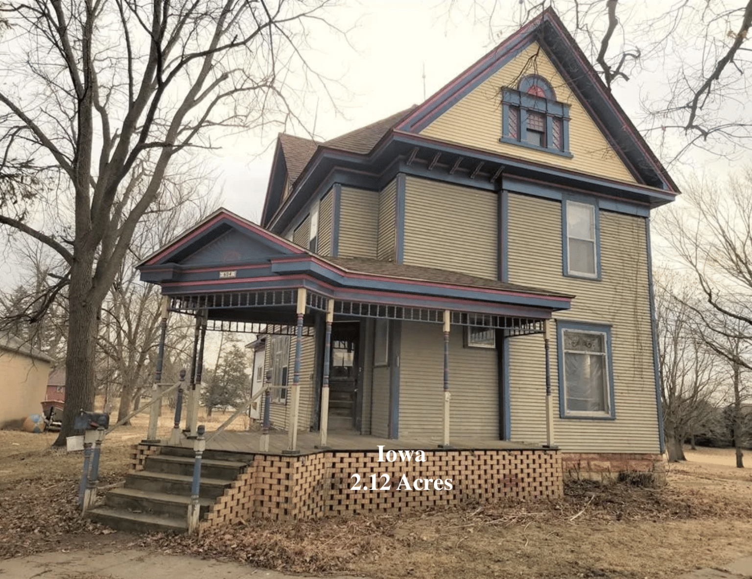 Cheapish Circa 1910 Iowa Painted Lady on 2.12 Acres Under $100K