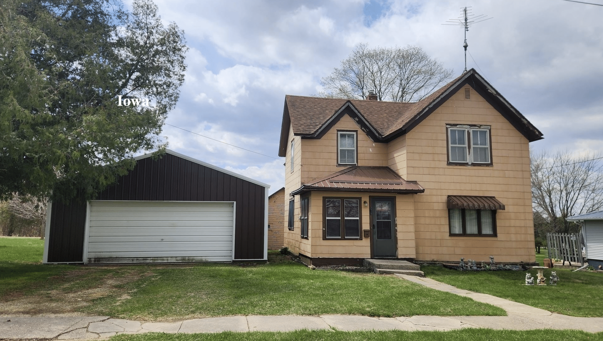 Circa 1900 Iowa Farmhouse For Sale on Half Acre + Under $50K